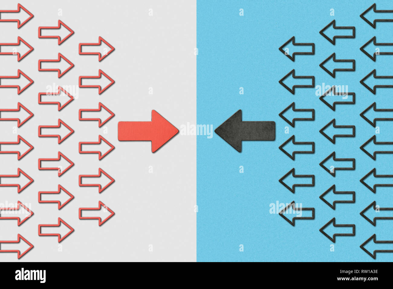 top view of horizontal opposite red and black pointers on blue and grey ...