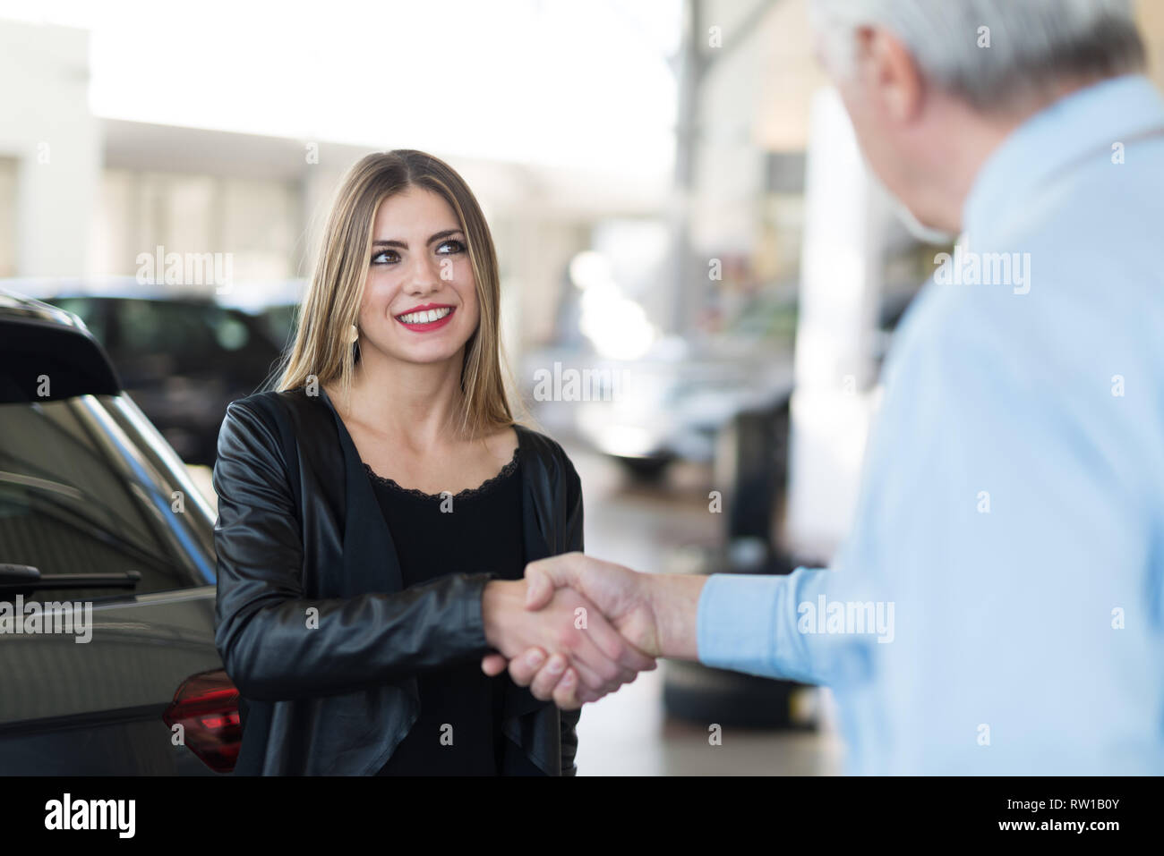 Car dealer new car concept, handshake Stock Photo - Alamy