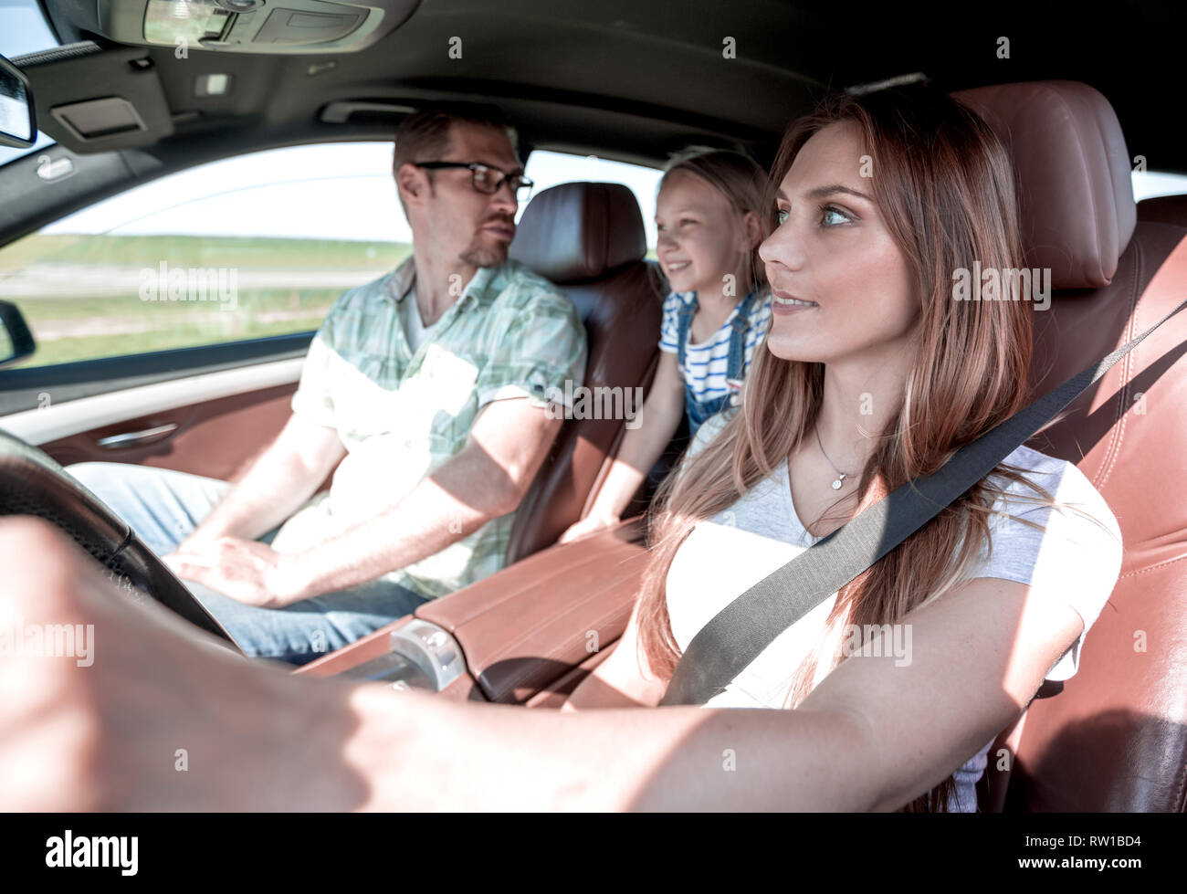 mom driving a family car Stock Photo - Alamy