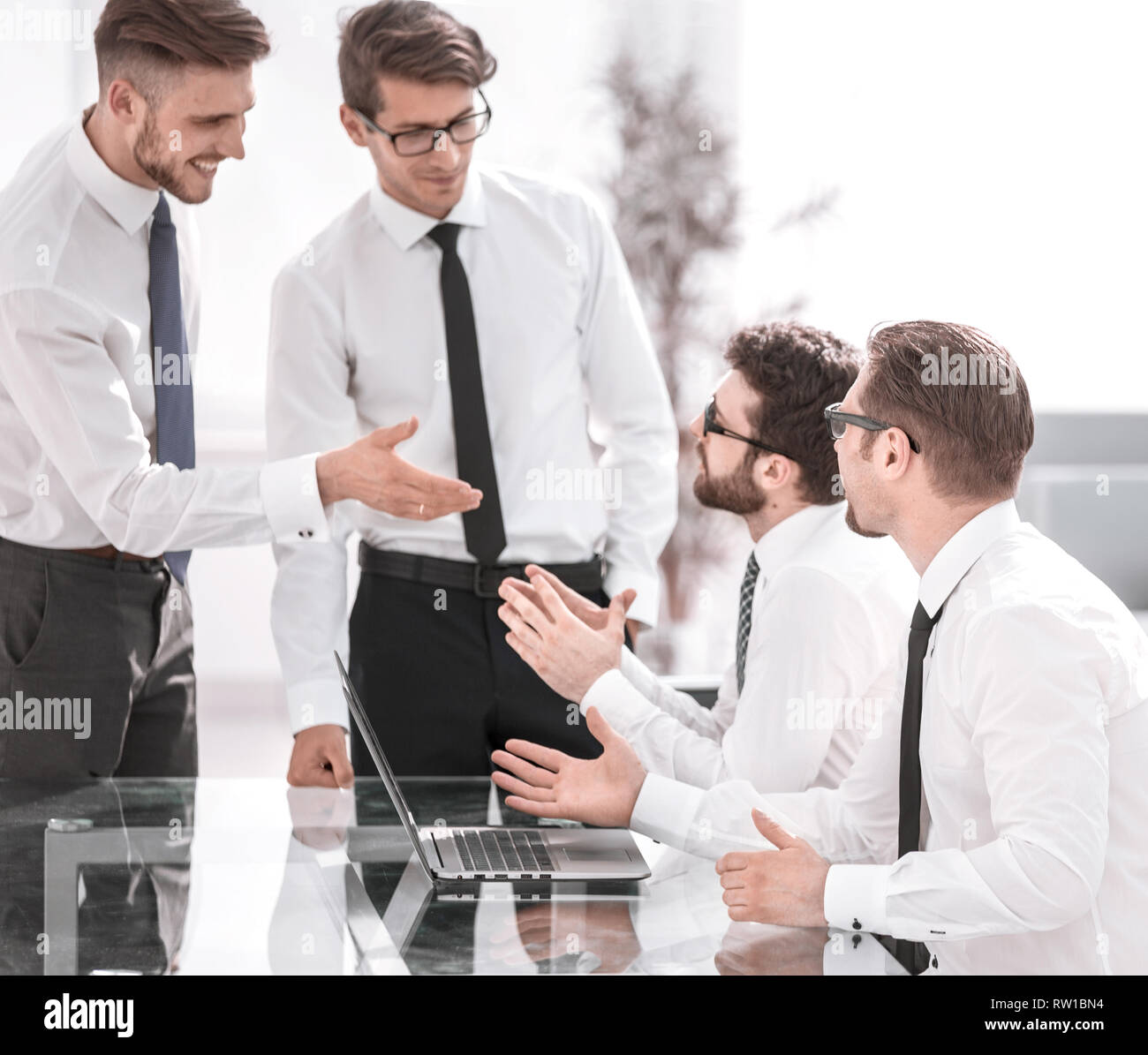 group of employees discussing ideas for a new project Stock Photo - Alamy