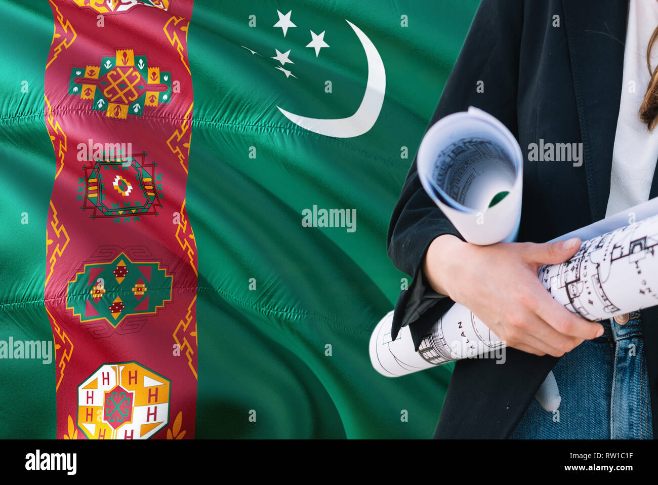 Turkmen Architect woman holding blueprint against Turkmenistan waving ...