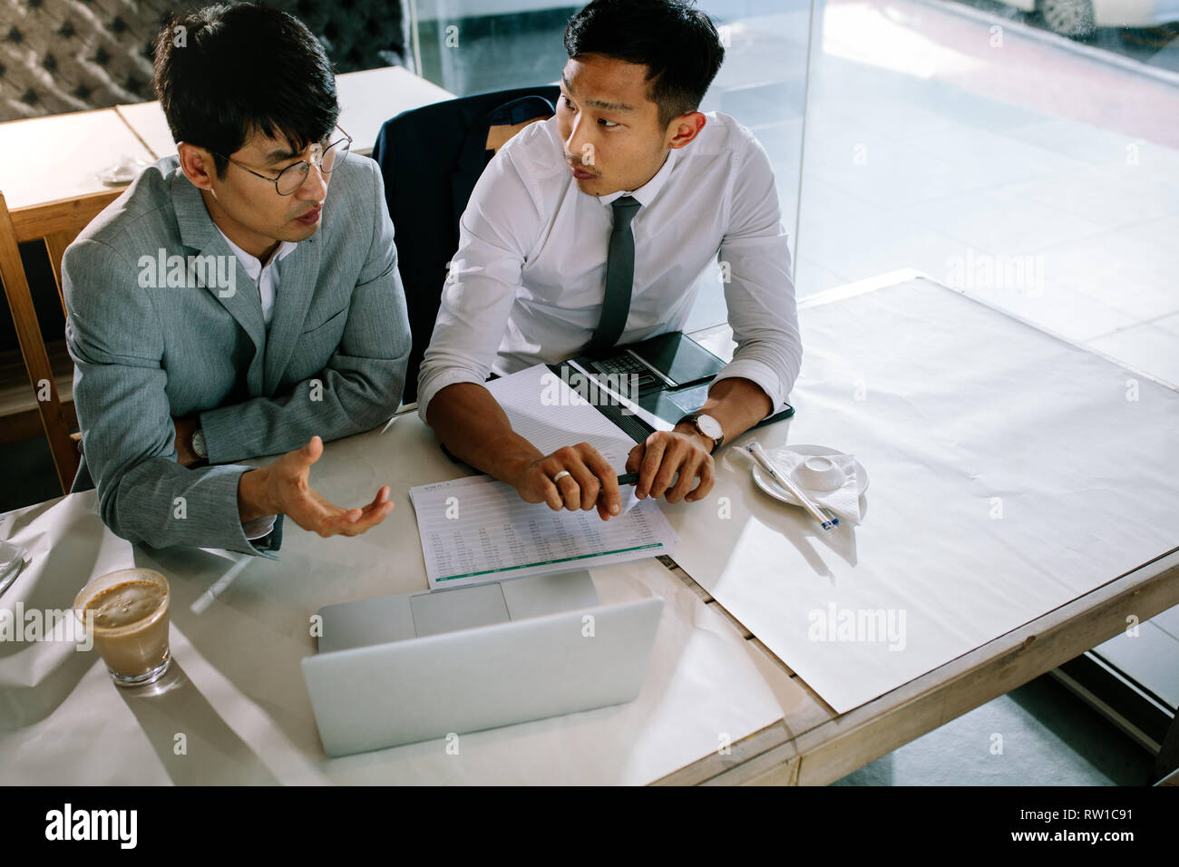 Asian men meeting hi-res stock photography and images - Alamy