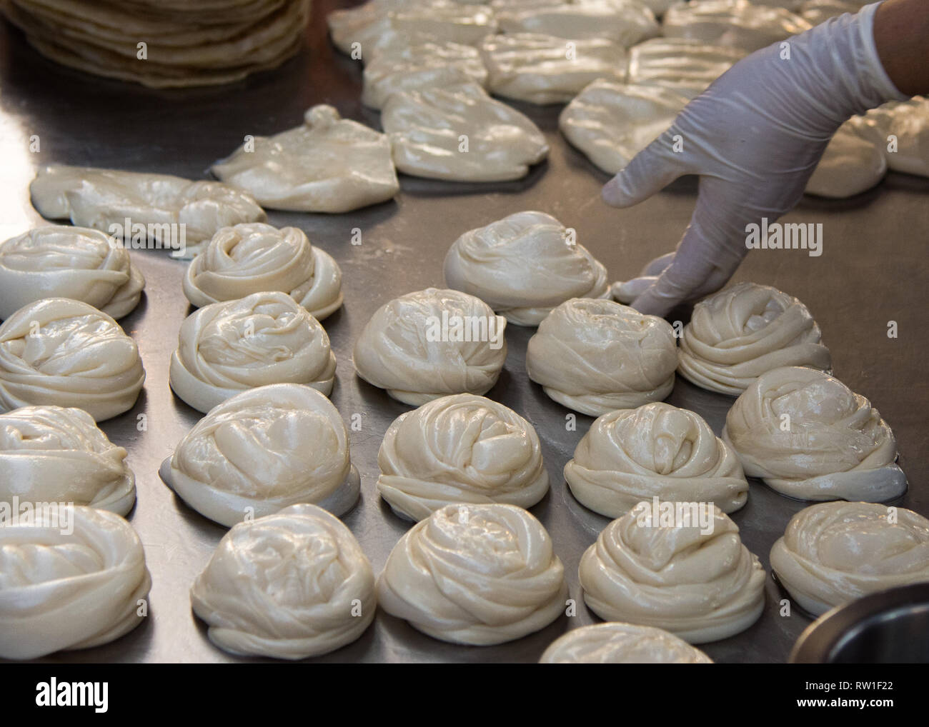 Making of Roti Canai, cooking process, Indian traditional street food ...