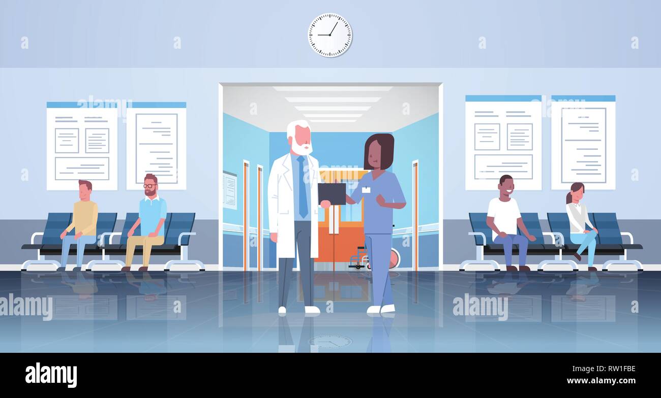 doctor and nurse discussing in hospital waiting hall corridor over mix ...