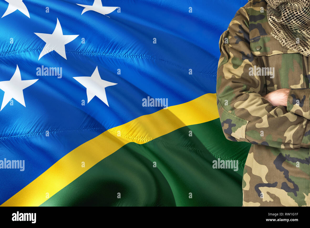 Crossed arms soldier with national waving flag on background - Solomon ...