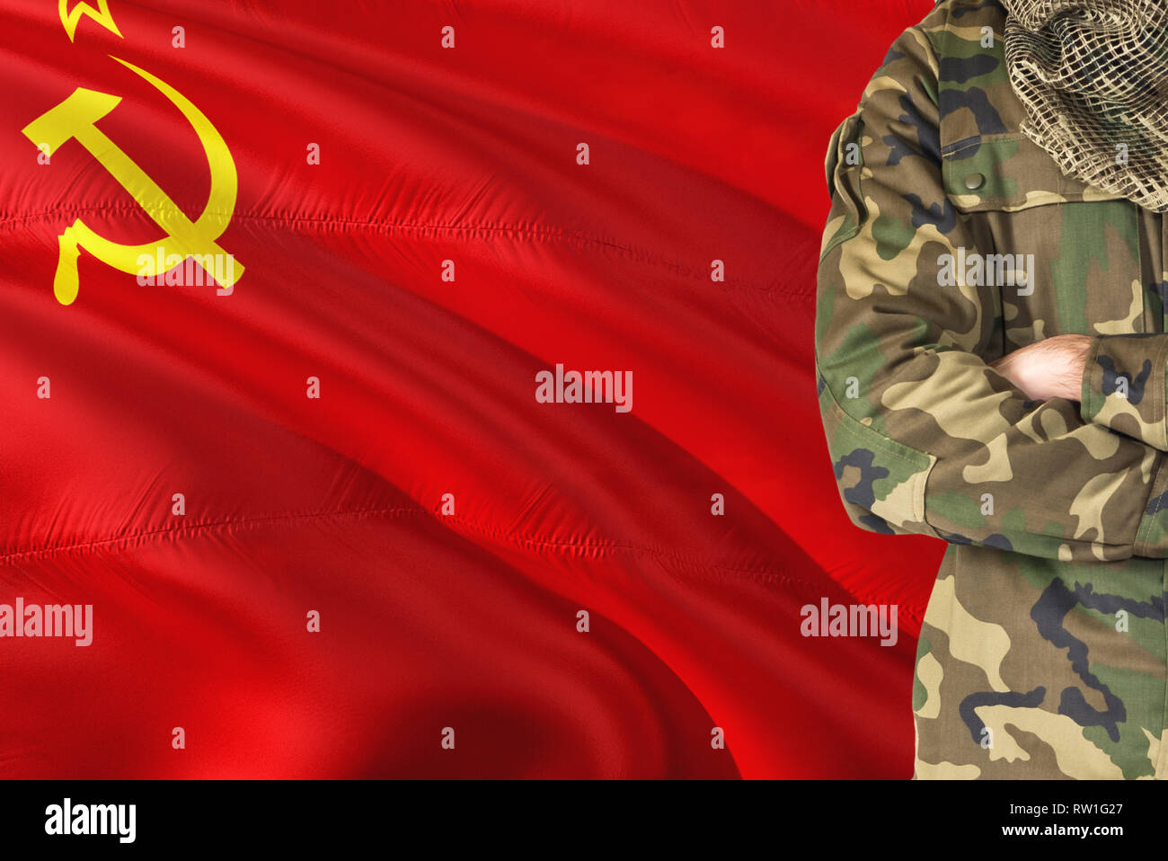 Crossed arms soldier with national waving flag on background - Soviet ...