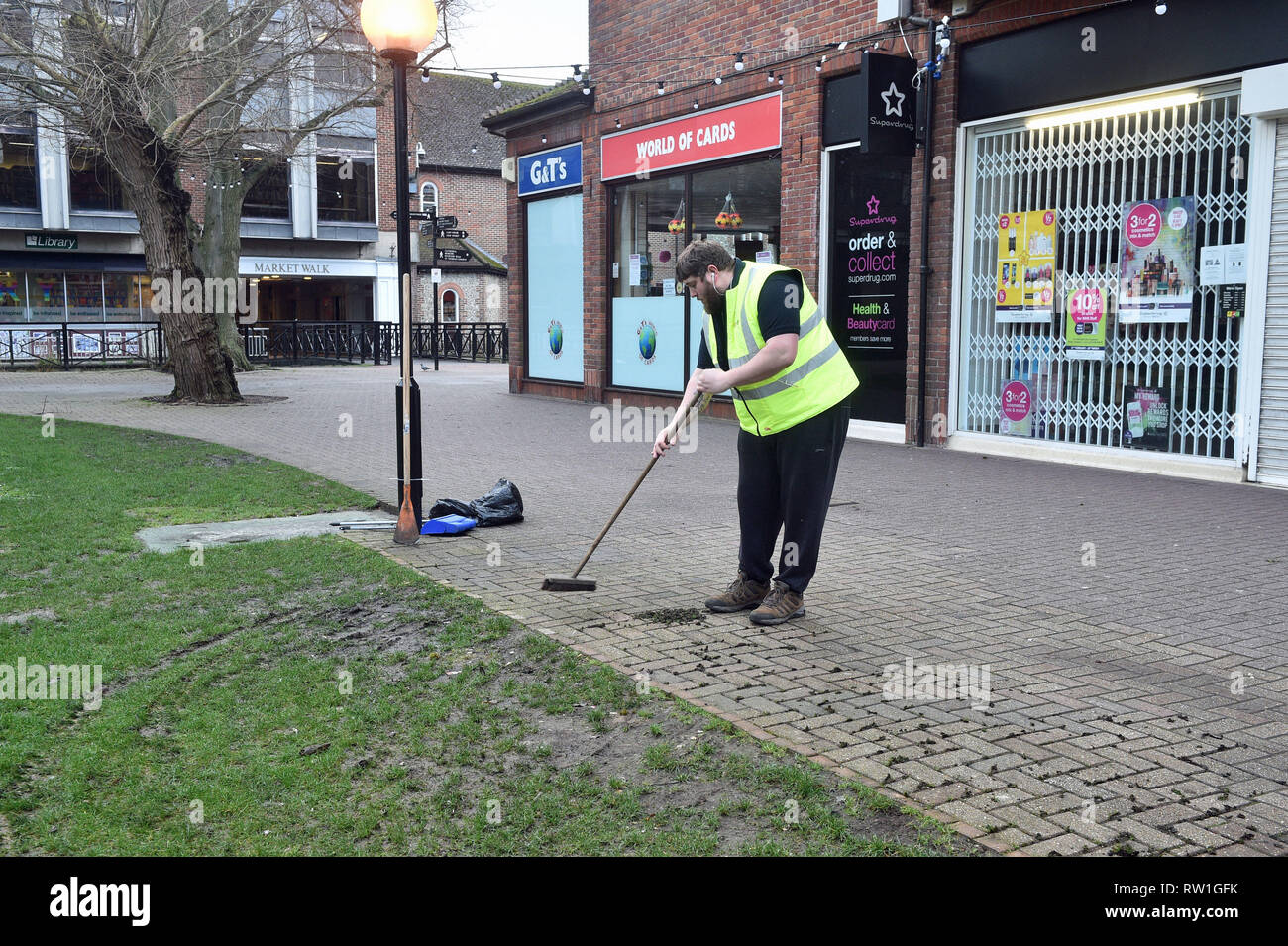 Retransmission: amends spelling of Skripal. A man cleans the spot where ...