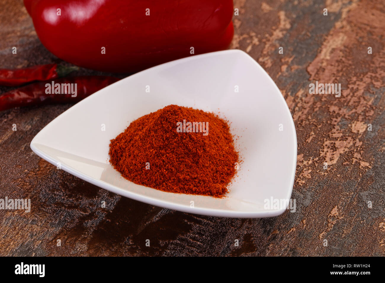 Sweet Paprika powder in the bowl Stock Photo - Alamy