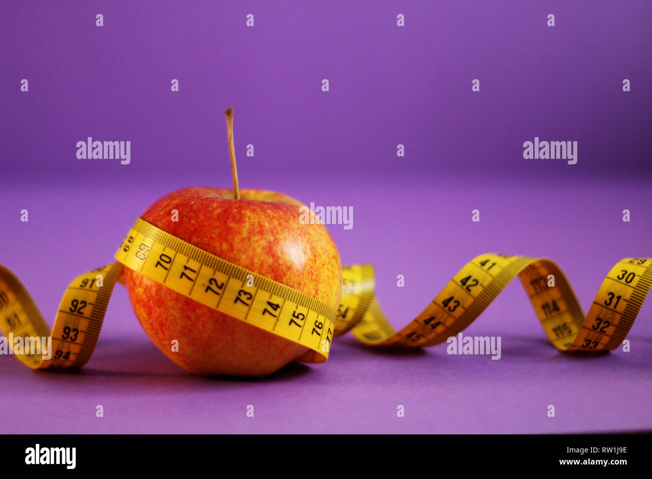 Purple measuring tape hi-res stock photography and images - Alamy