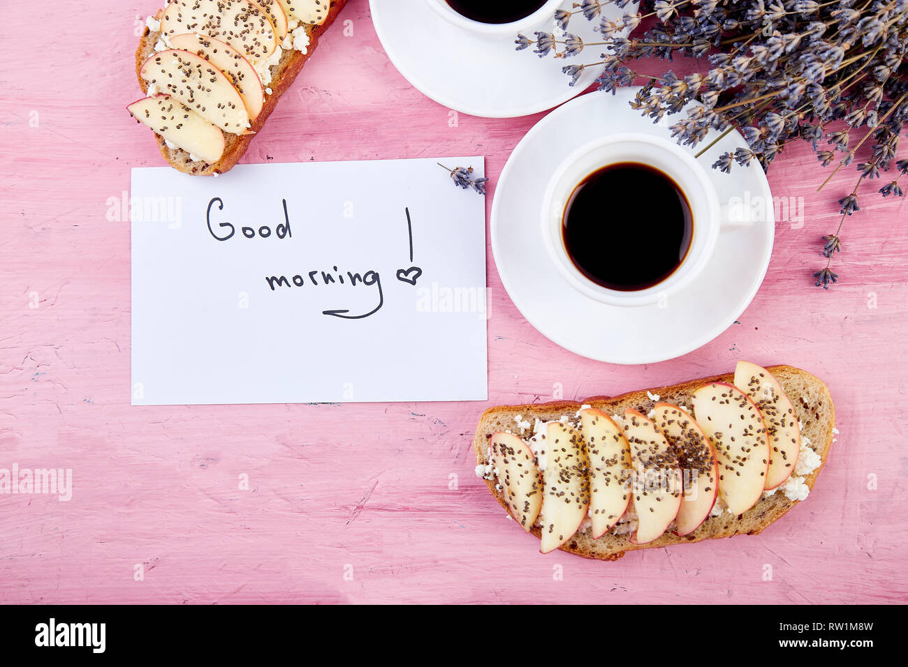 Two cups of coffee with bouquet of flowers lavender and healthy toasts ...