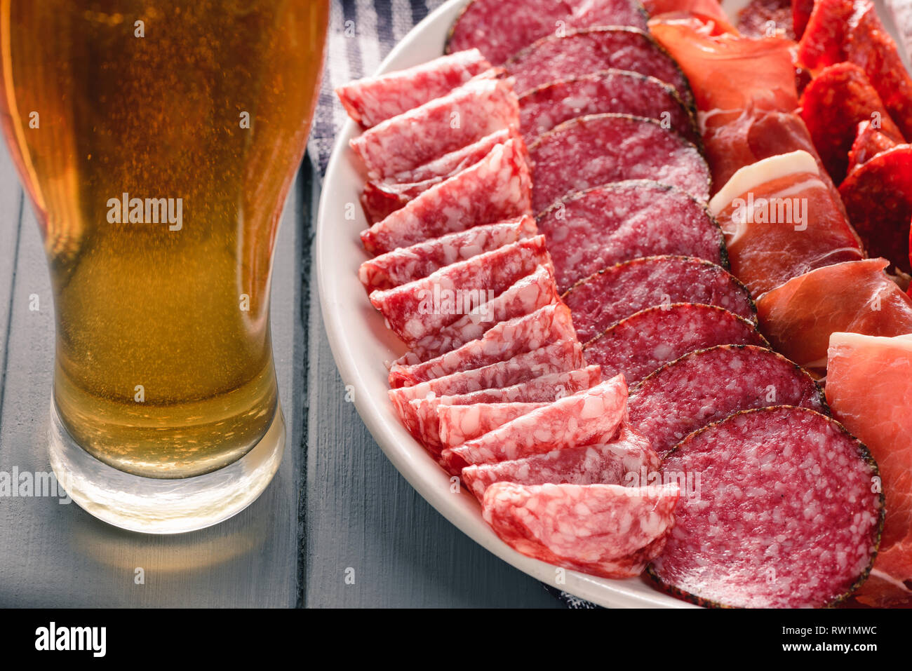 Pint of beer and platter Stock Photo - Alamy
