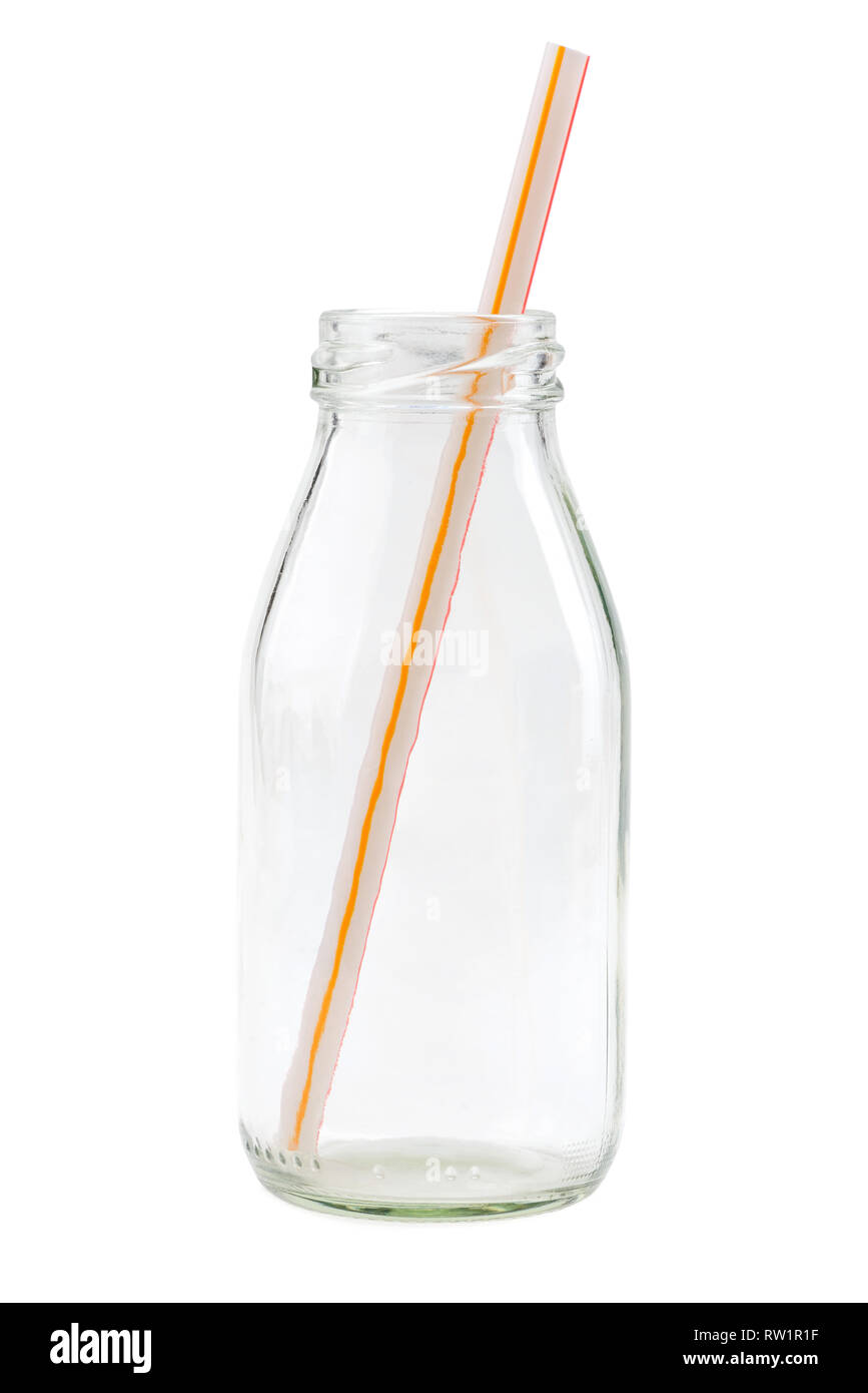 Glass bottle with a straw Stock Photo - Alamy