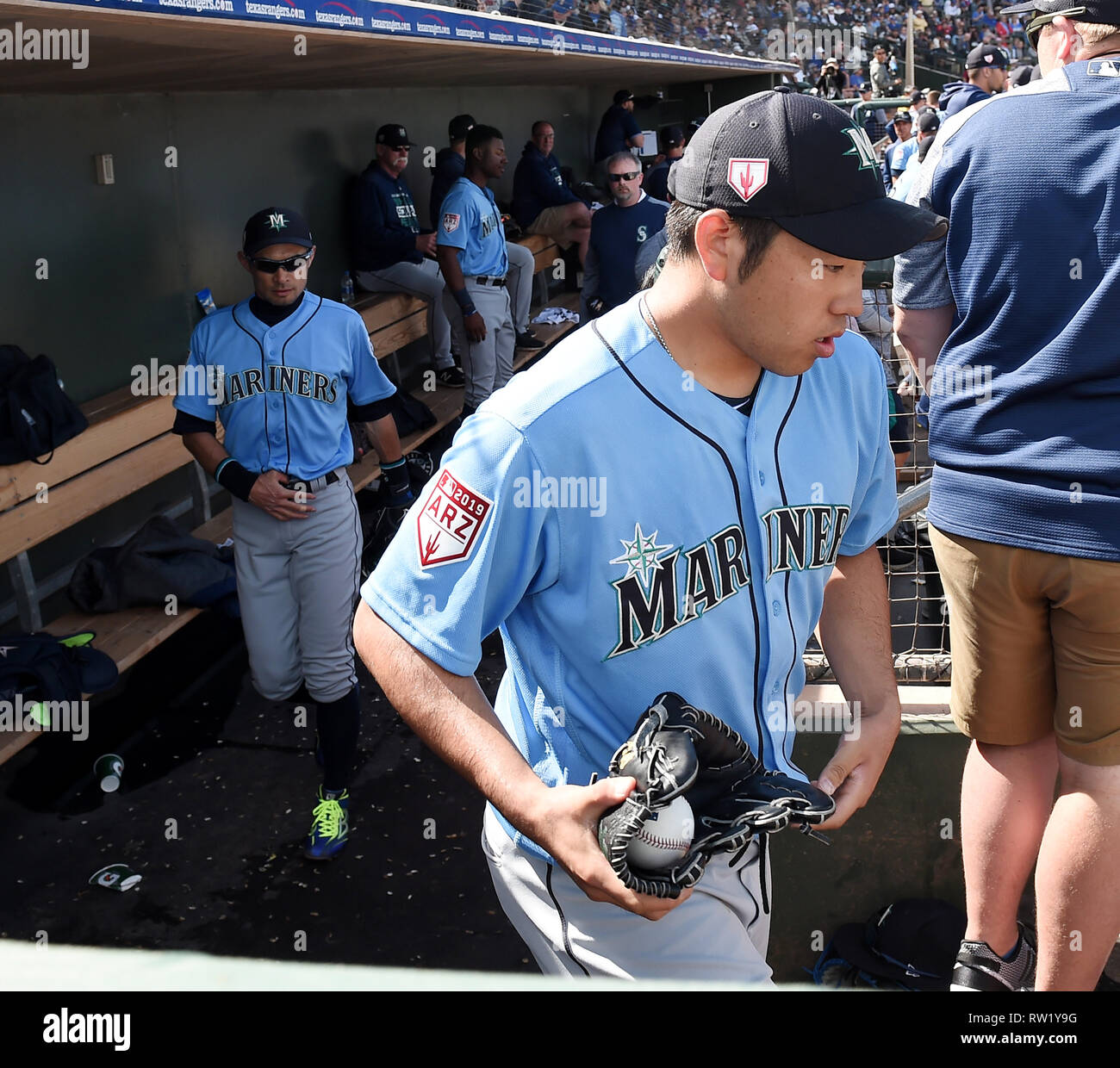 Seattle Mariners' starting pitcher Yusei Kikuchi (R) and right fielder ...