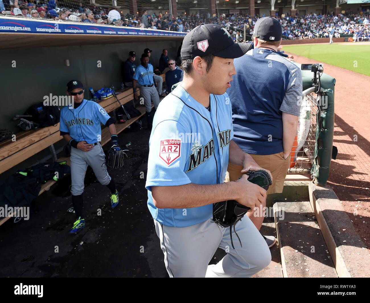 Seattle Mariners' starting pitcher Yusei Kikuchi (R) and right fielder ...