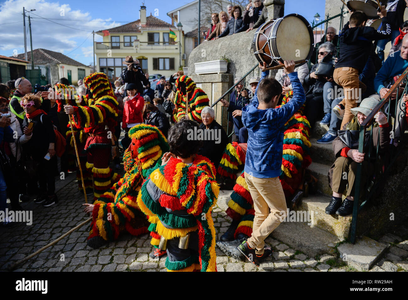 Podence, Portugal. 3rd Mar, 2019. Caretos are seen relaxing together ...