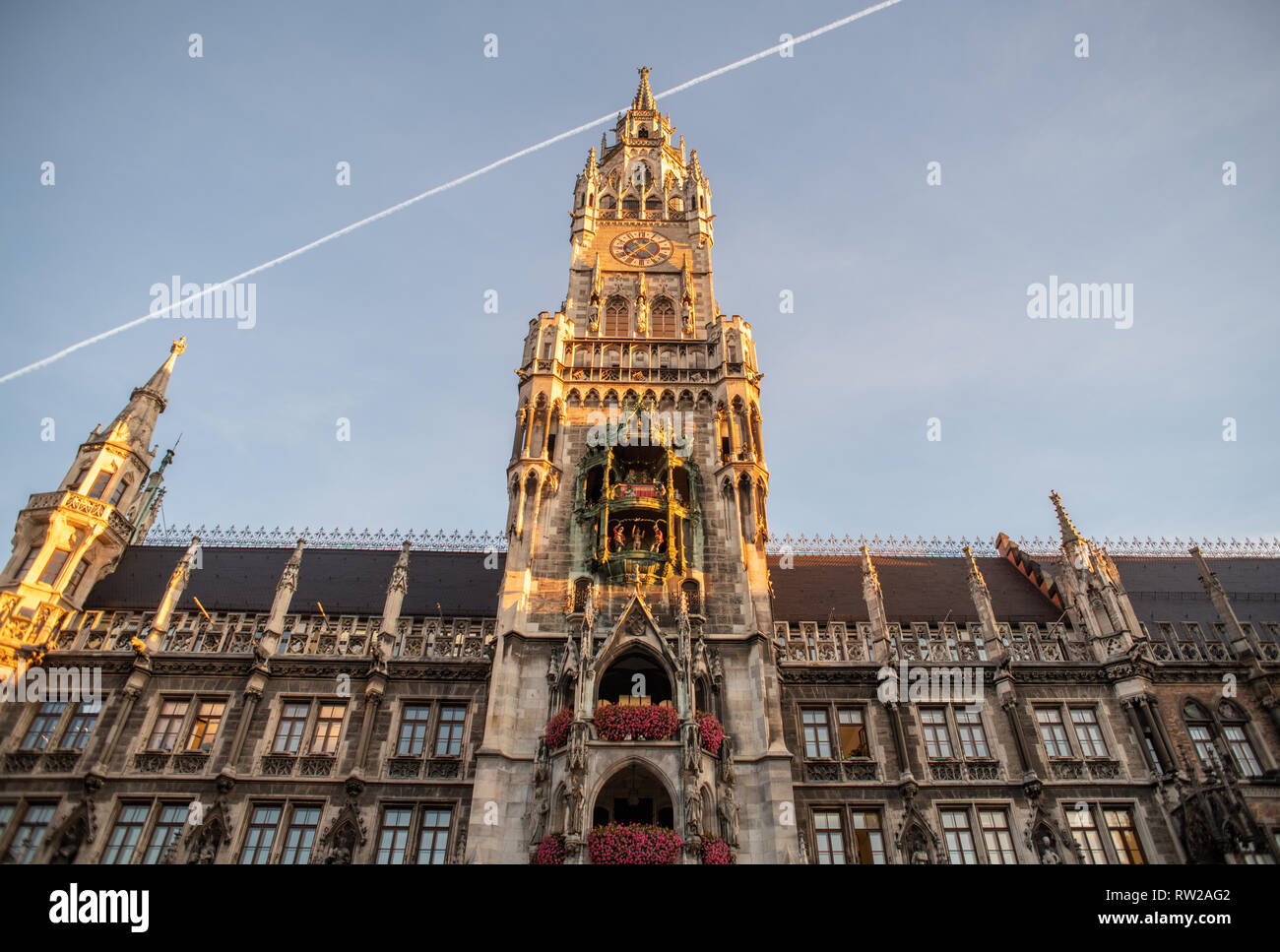 Rathaus a city hall building and its clocktower in the sunlight in ...