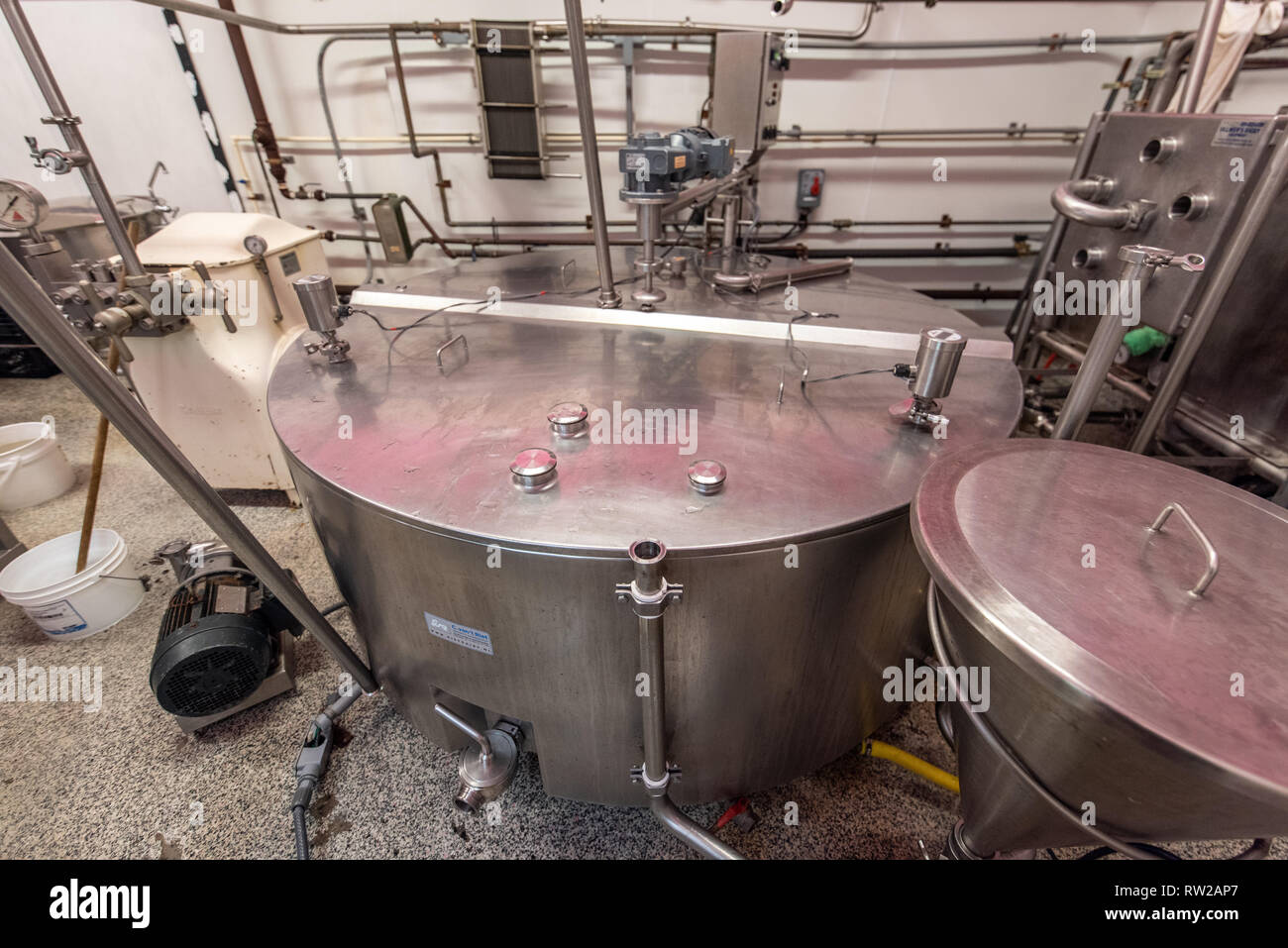 Machinery used to make and cheese at dairy processing facility ...