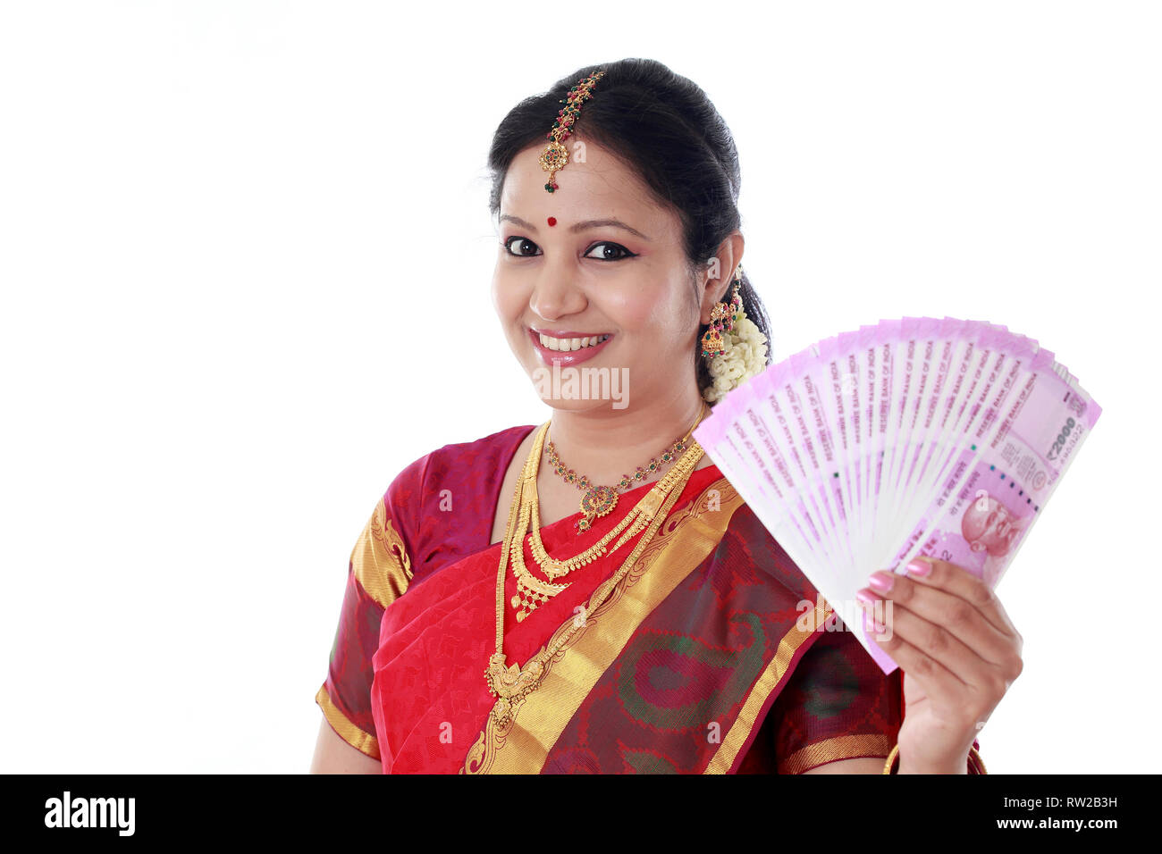 Woman holding indian paper currency hi-res stock photography and images ...