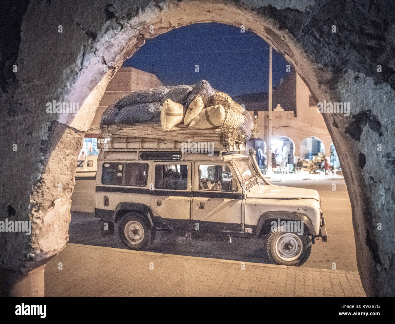Overloaded Land Rover Defender 110, Foum Zguid, Morocco Stock Photo - Alamy