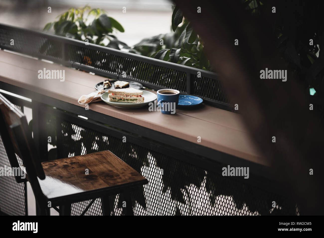 Abstract scene of breakfast meal set including tuna sandwich, hot long ...