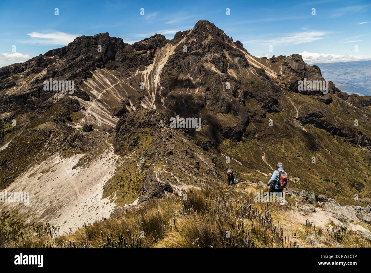 Group of climbers walking a path in the Pichincha Stock Photo - Alamy
