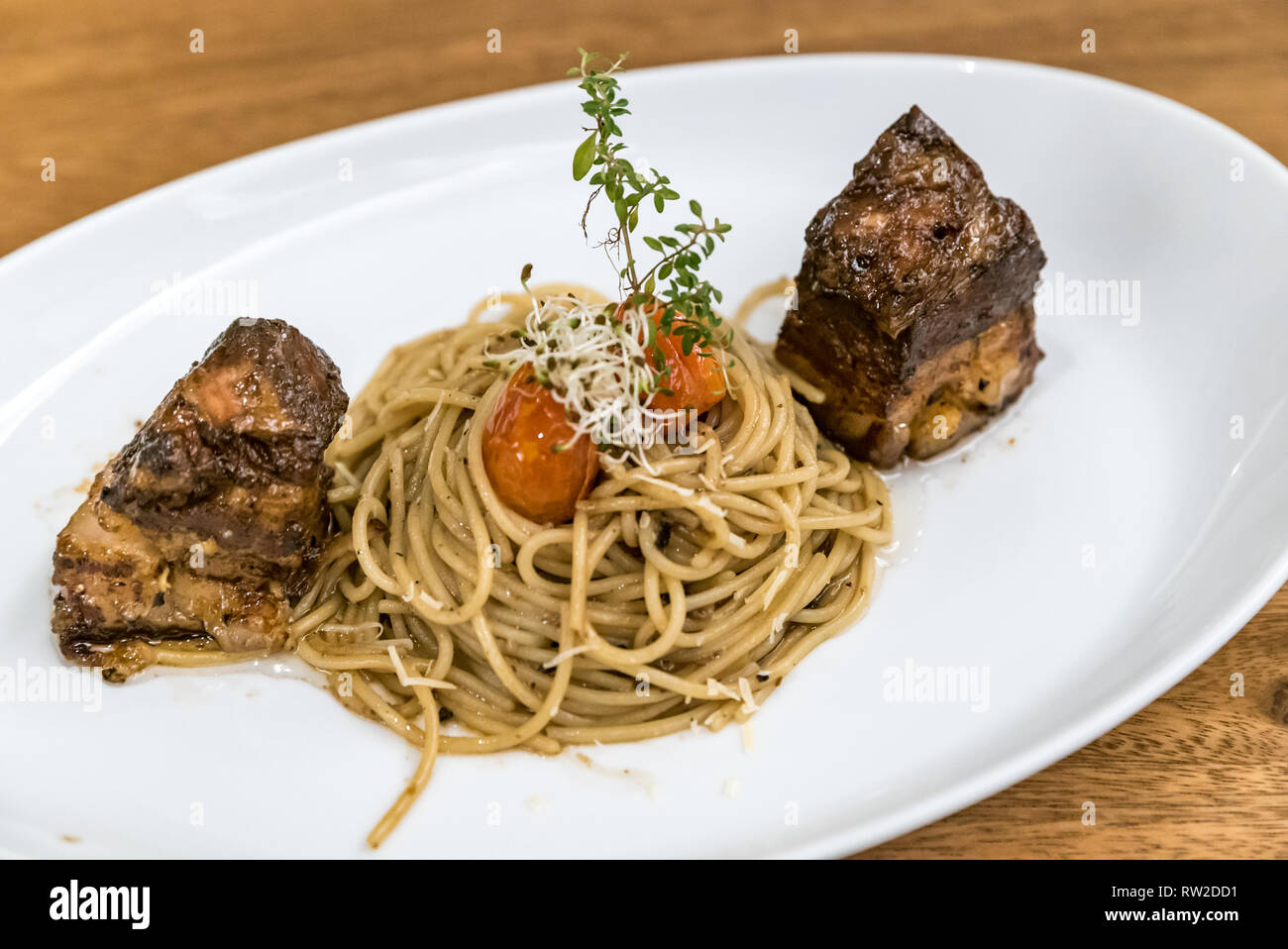 Spaghetti pasta with Pork Belly Thai southern style Stock Photo - Alamy