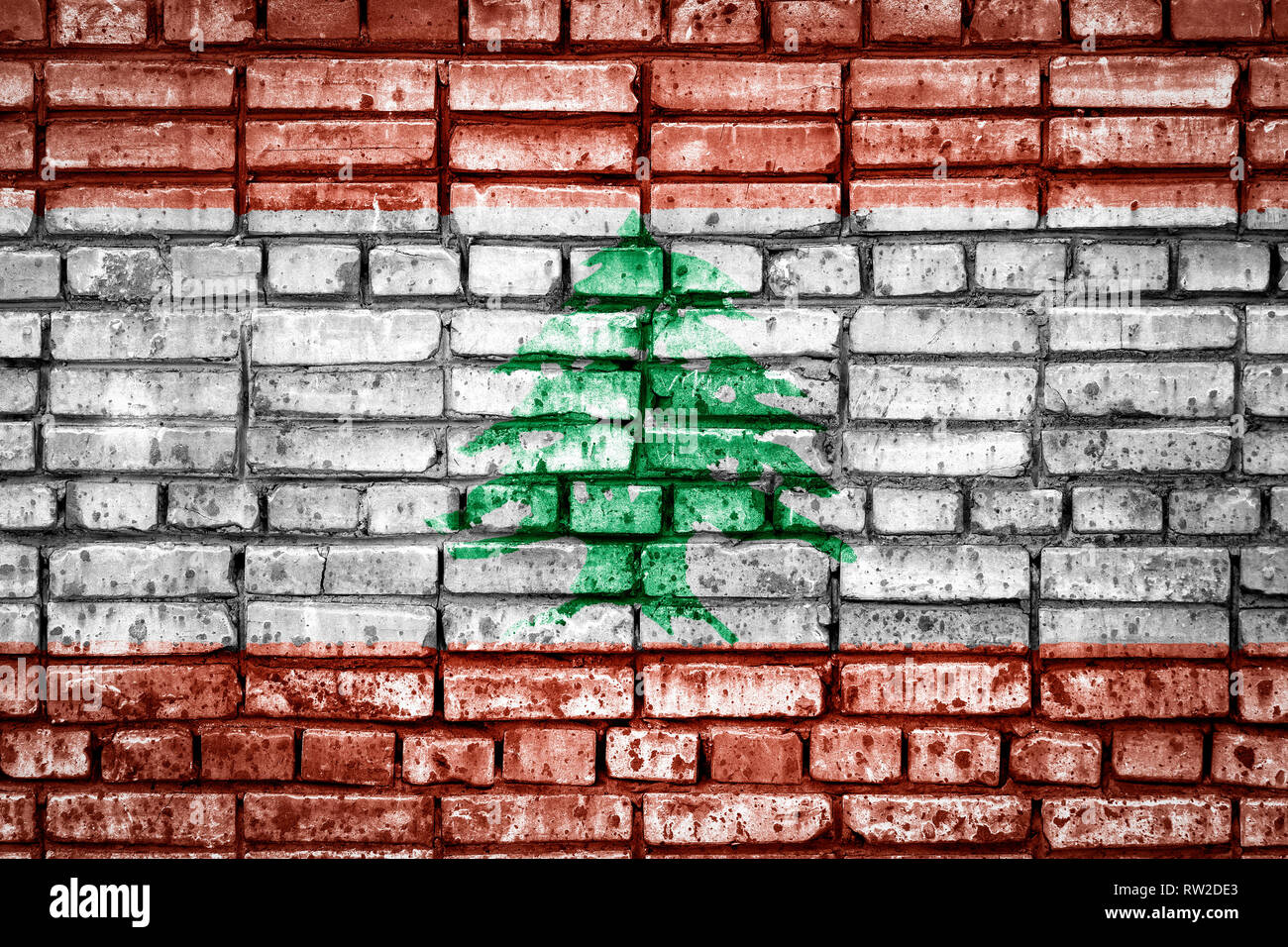 National flag of Lebanon on a brick background. Concept image for ...