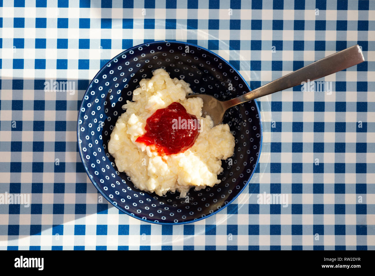 Homemade rice pudding with strawberry jam Stock Photo - Alamy