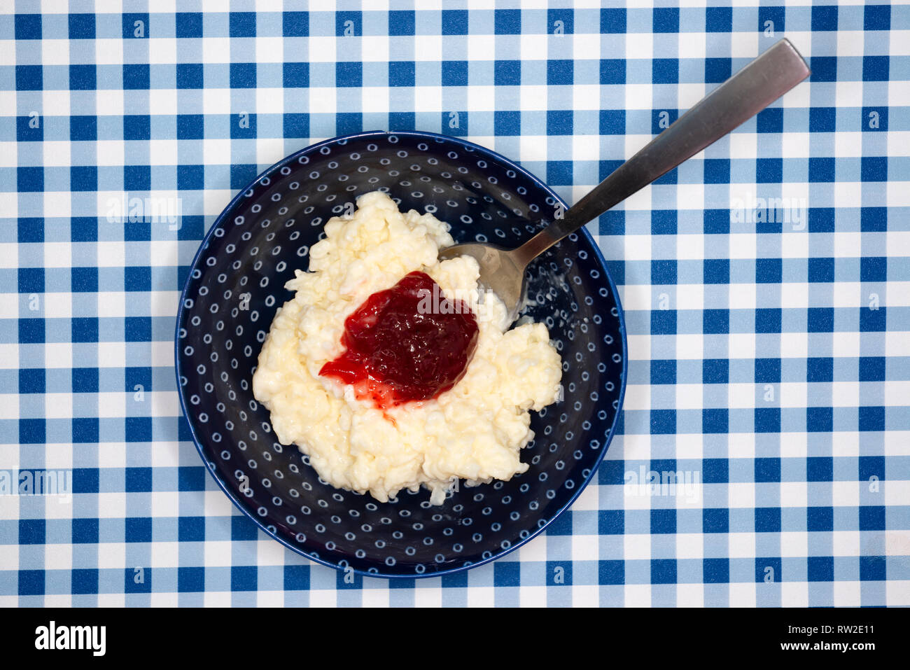 Homemade rice pudding with strawberry jam Stock Photo - Alamy