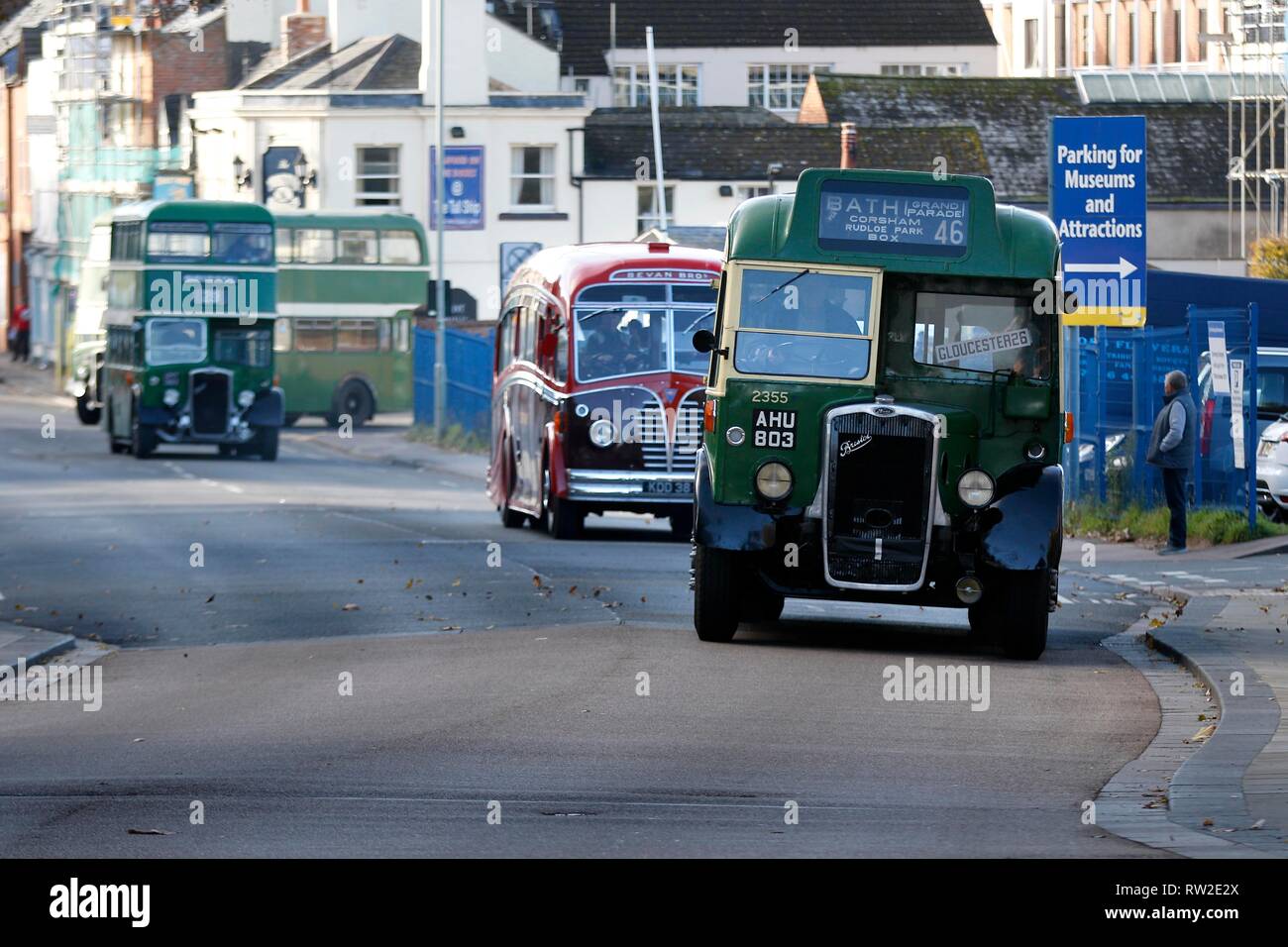 A cavalcade of 20 classic buses driving through Gloucester city centre ...