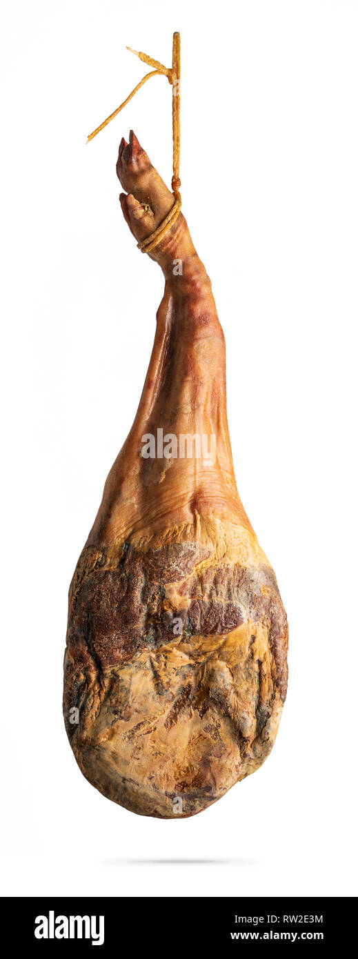 Whole leg of Spanish Iberian serrano ham hanging on a rope. Isolated on ...