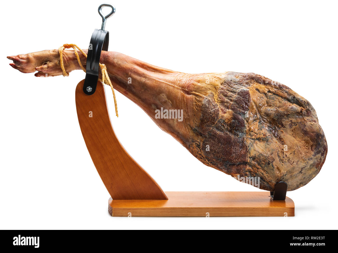 Whole leg of Spanish Iberian serrano ham in wooden support (jamoneror ...