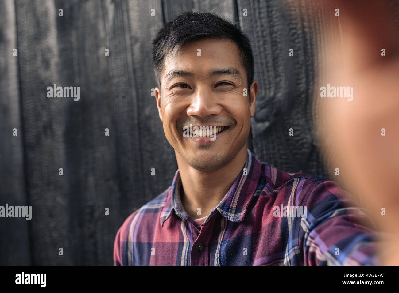 Asian man taking photograph hi-res stock photography and images - Alamy