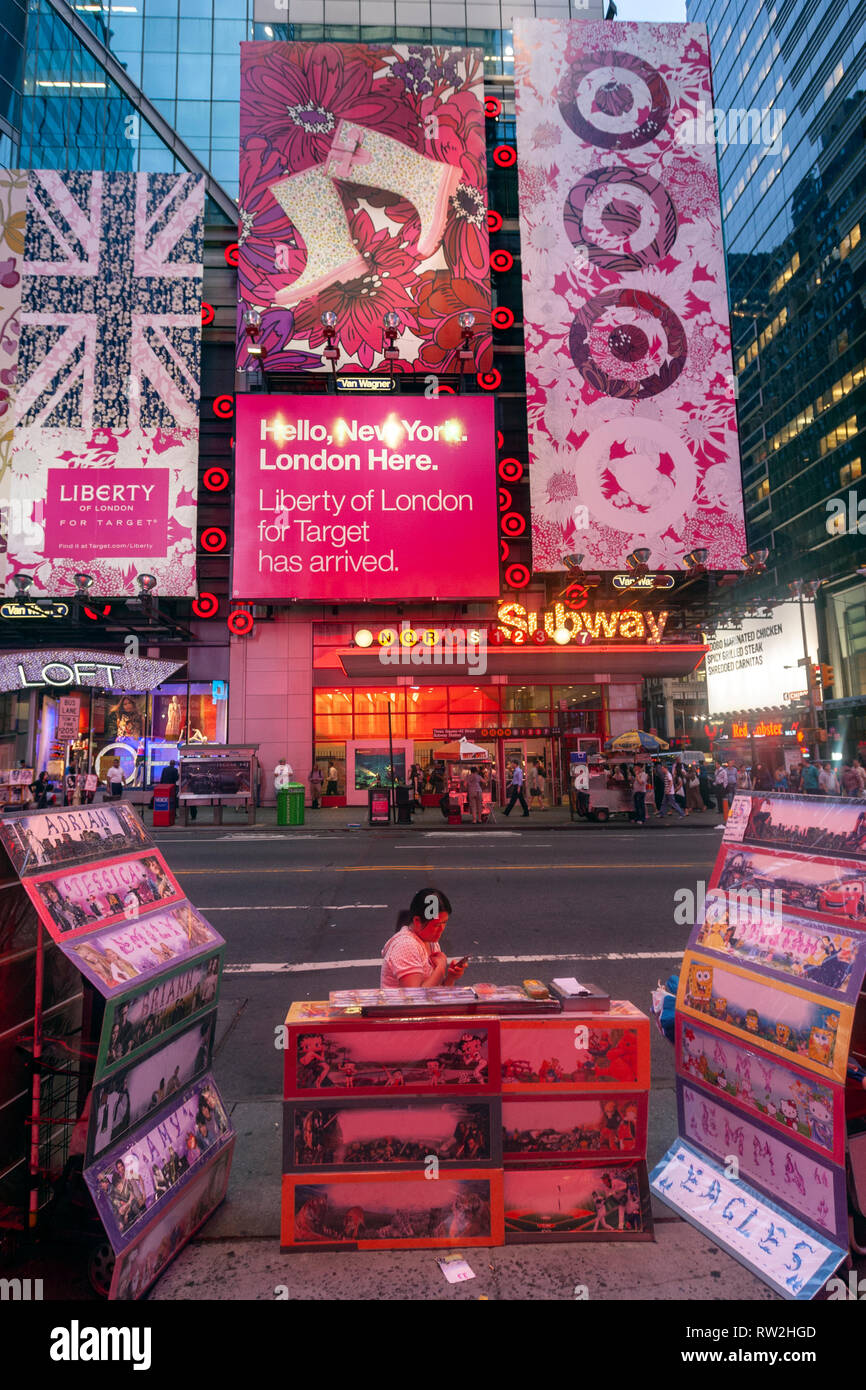 Liberty advertisement and a street selling prints with names in ...