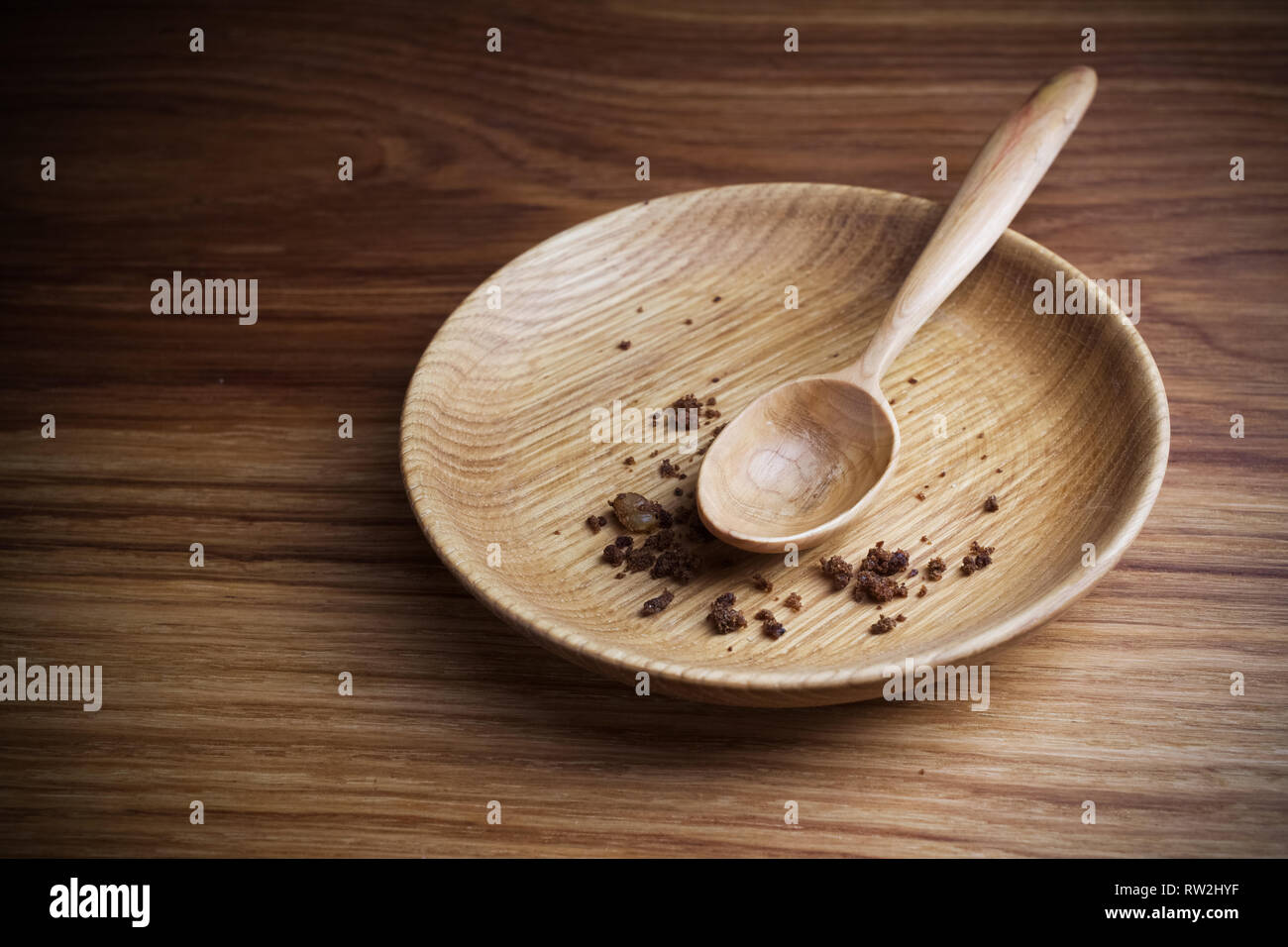 Fasting, Lent. Plate with spoon and crumb on wooden background Stock ...