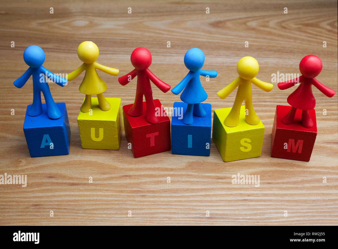 Doll children background design with autism word on cubes Stock Photo ...