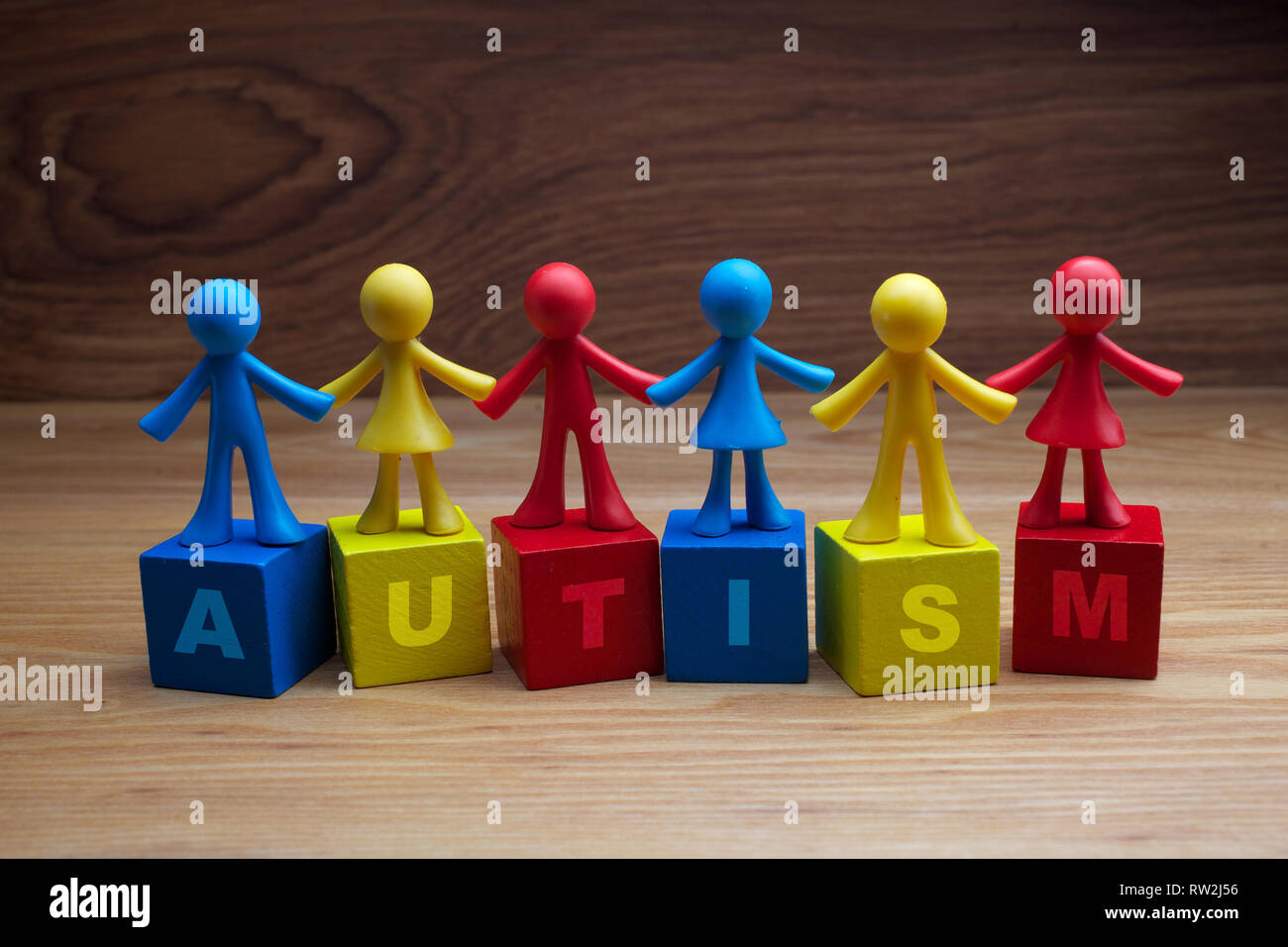 Doll children background design with autism word on cubes Stock Photo ...