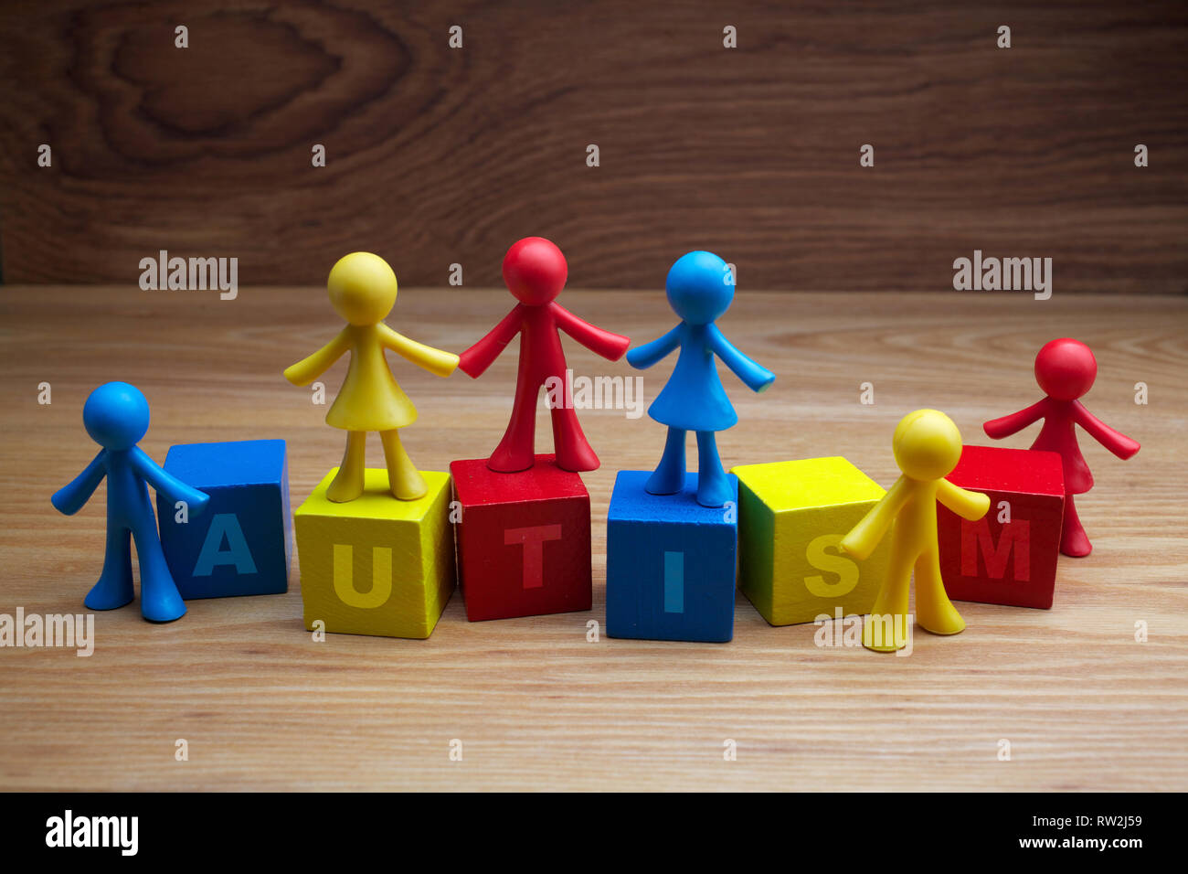 Doll children background design with autism word on cubes Stock Photo ...