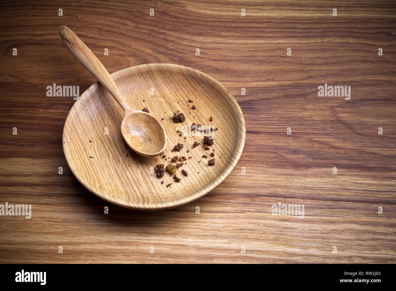 Fasting, Lent. Plate with spoon and crumb Stock Photo - Alamy