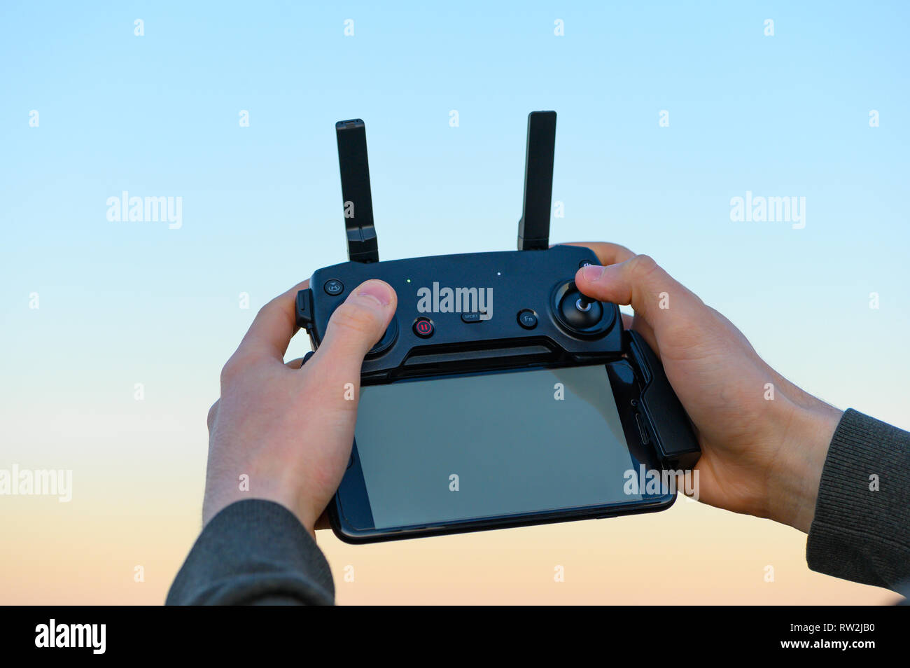 Drone controller in human hands Stock Photo - Alamy
