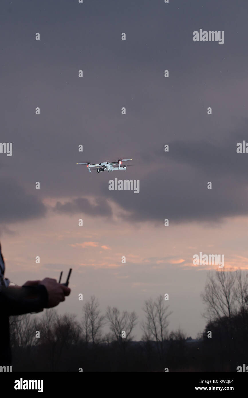 The man controls the dron with the camera. (Shallow DOF Stock Photo - Alamy