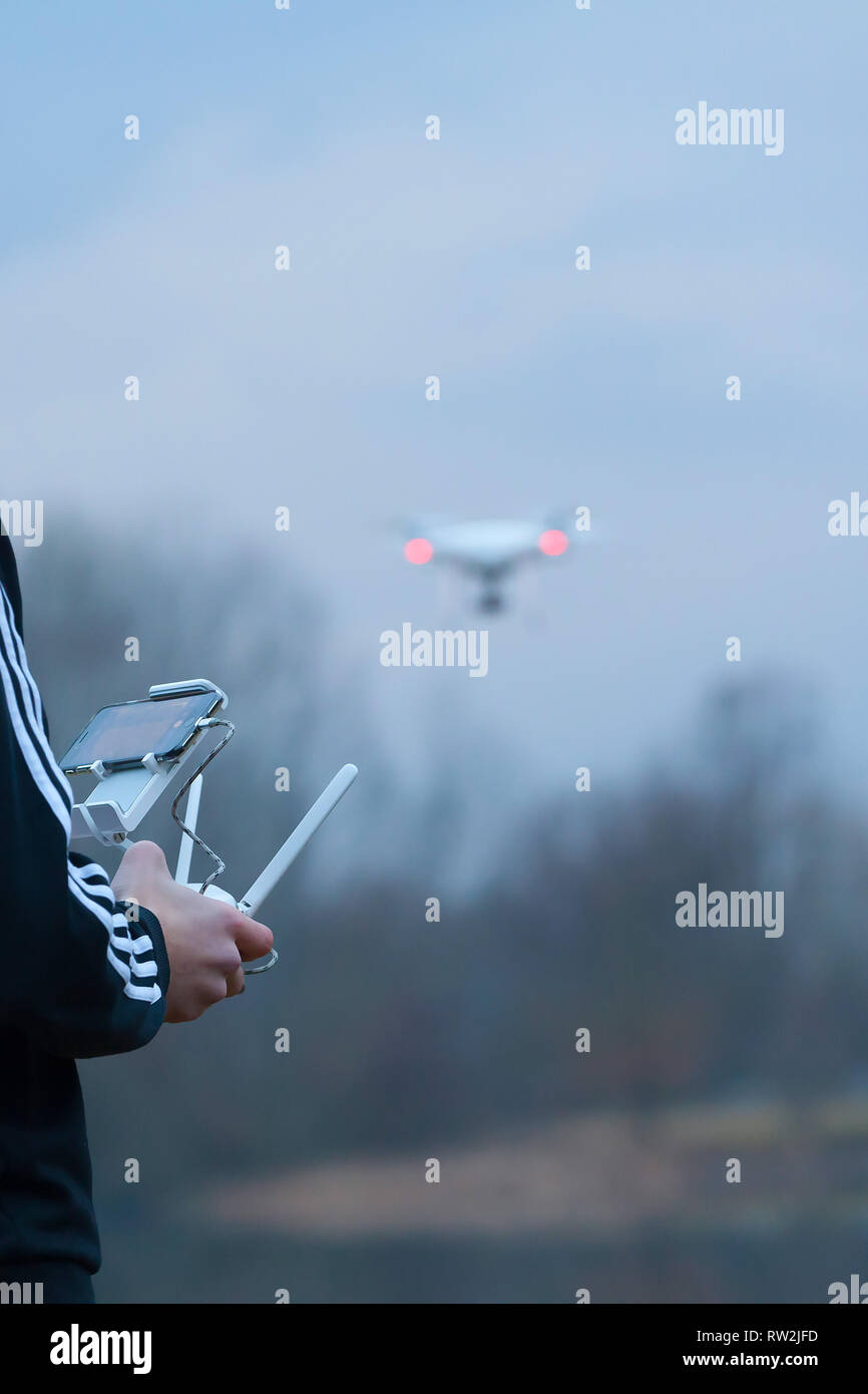 The man controls the dron with the camera. (Shallow DOF Stock Photo - Alamy