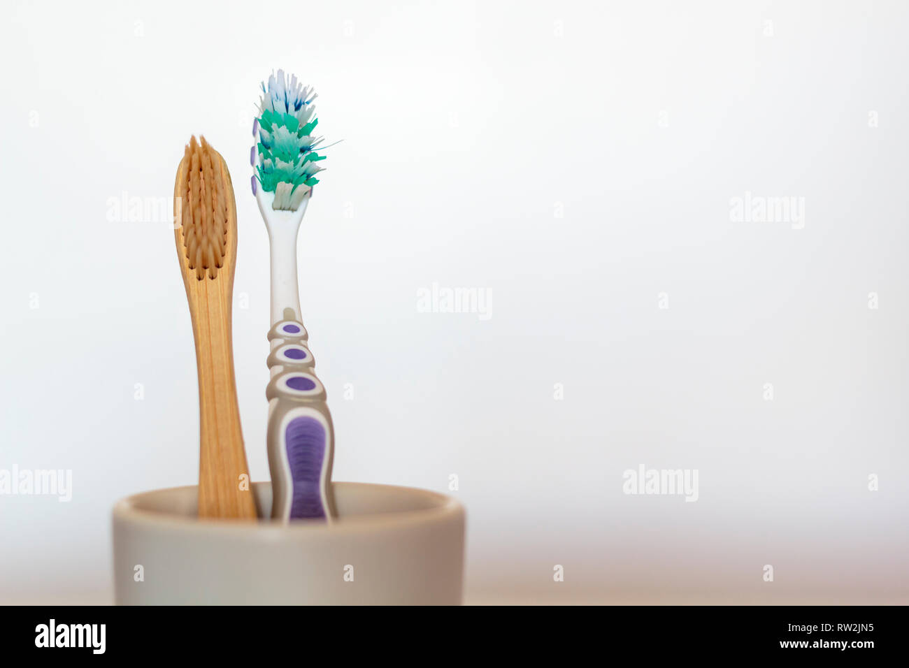Plastic toothbrush and bamboo toothbrush. Zero waste and Sustainable ...