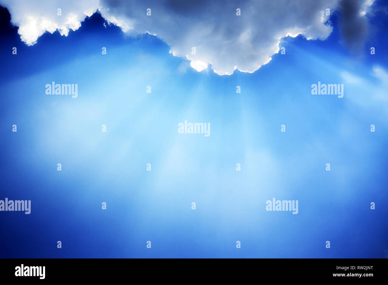 light rays from the sun go trough clouds Stock Photo - Alamy
