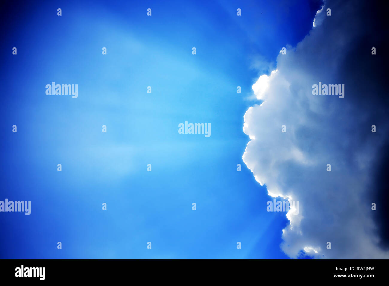 light rays from the sun go trough clouds Stock Photo - Alamy