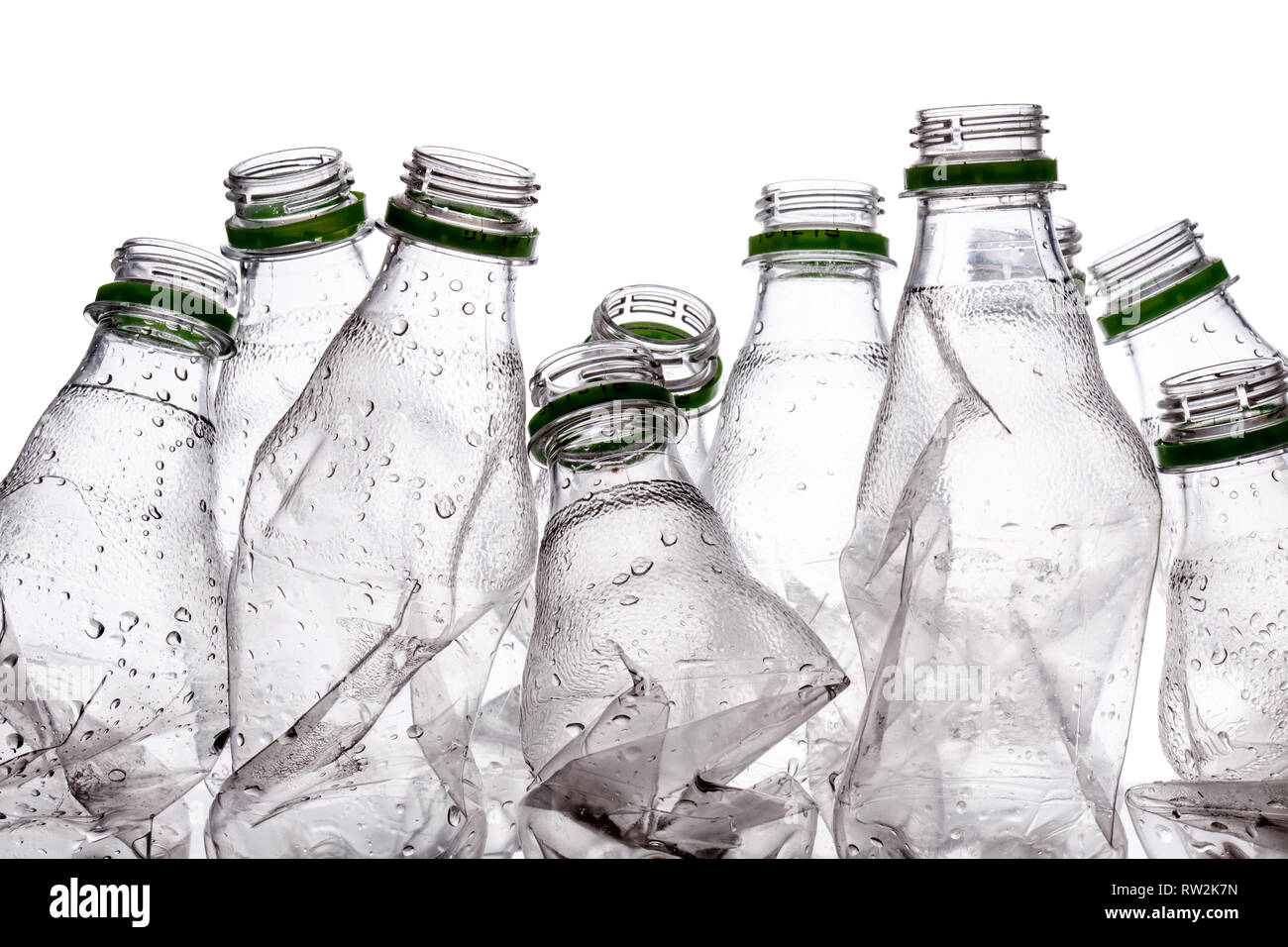 group of smashed empty plastic bottles, isolated on white background ...