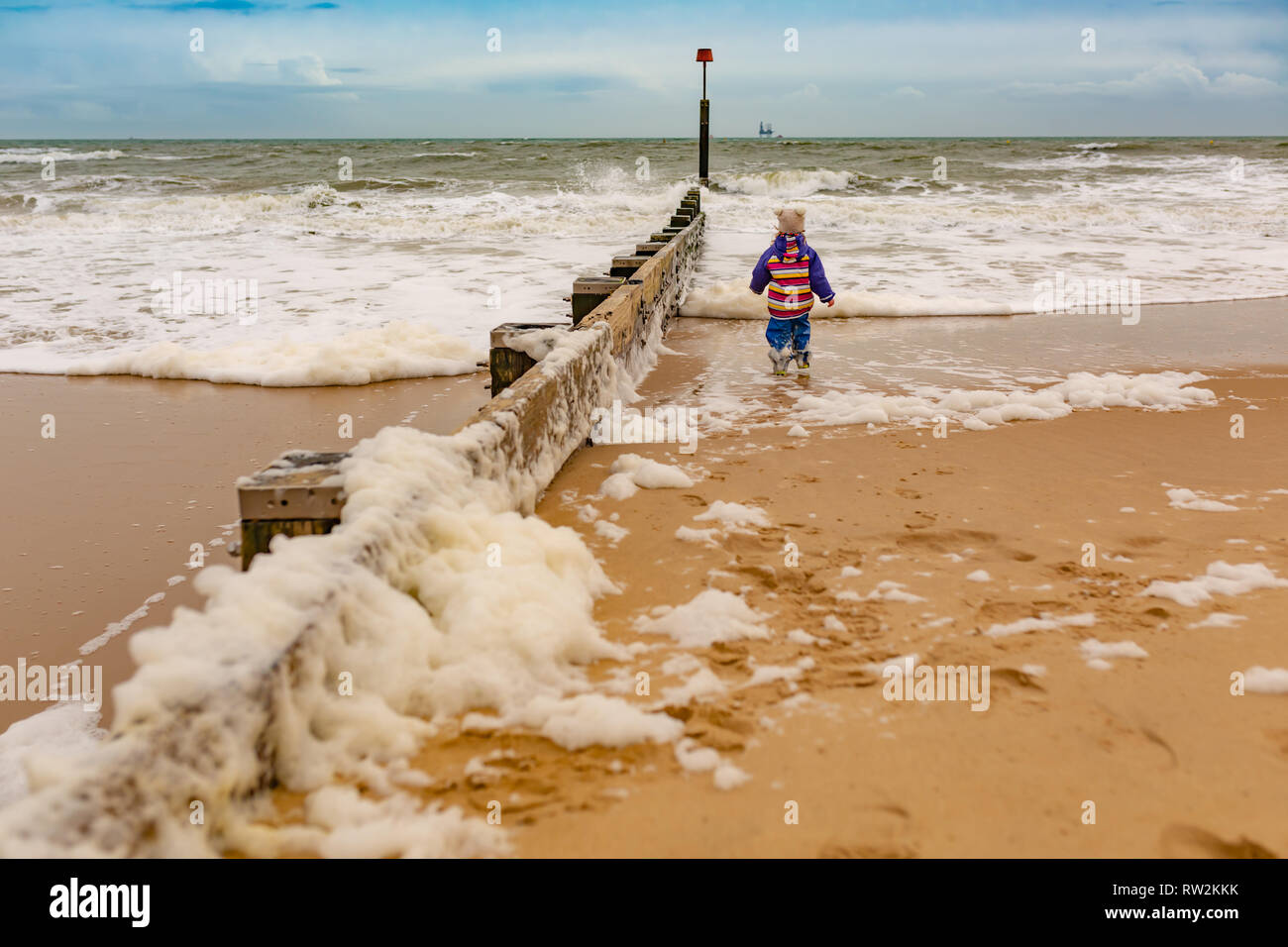 Child getting wet hi-res stock photography and images - Alamy