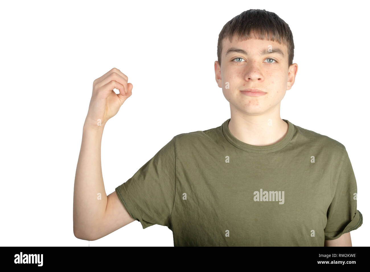 Caucasian teenage boy doing British Sign Language showing the symbol ...