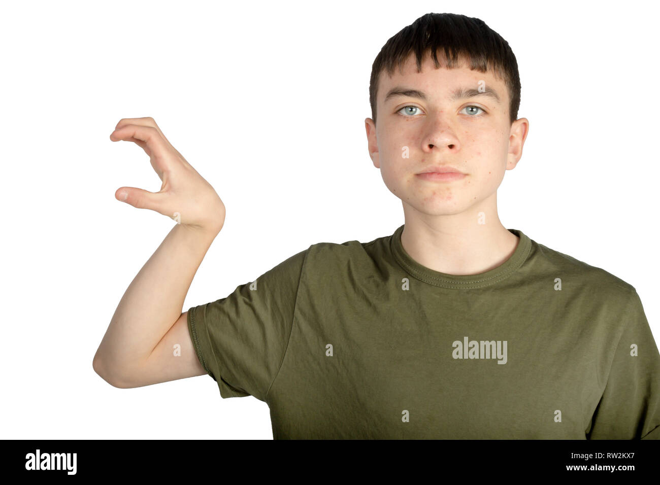 Caucasian teenage boy doing British Sign Language showing the symbol ...