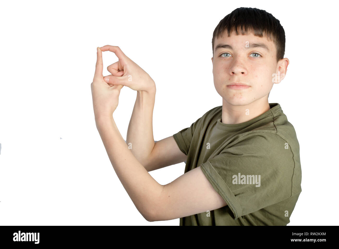Caucasian teenage boy doing British Sign Language showing the symbol ...